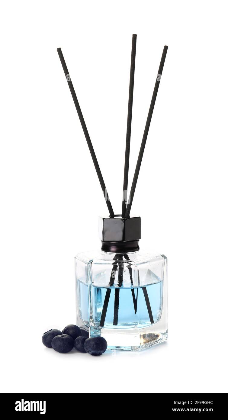 Reed diffuser with blueberry on white background Stock Photo - Alamy