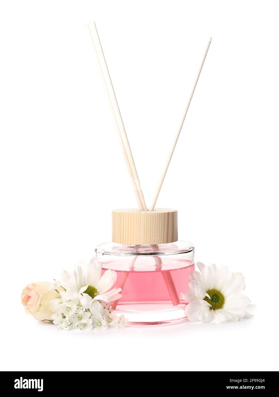Reed diffuser with flowers on white background Stock Photo - Alamy