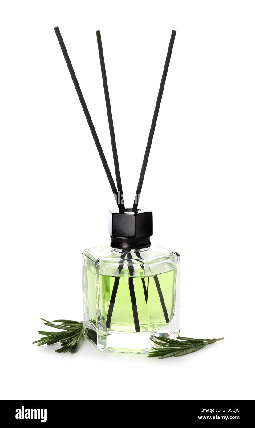 Reed diffuser with rosemary on white background Stock Photo - Alamy