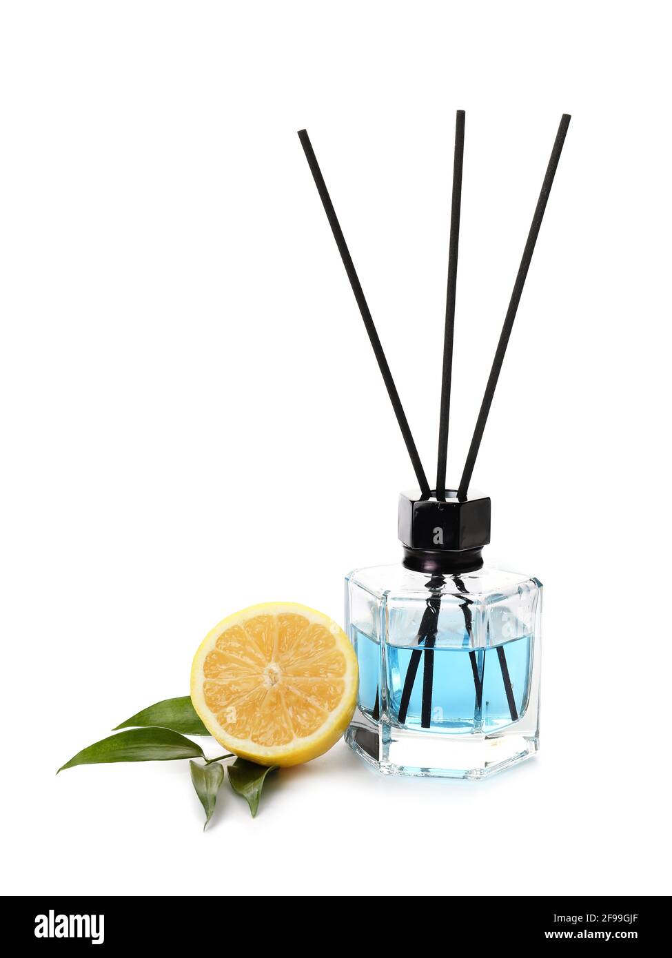 Reed diffuser with lemon on white background Stock Photo - Alamy