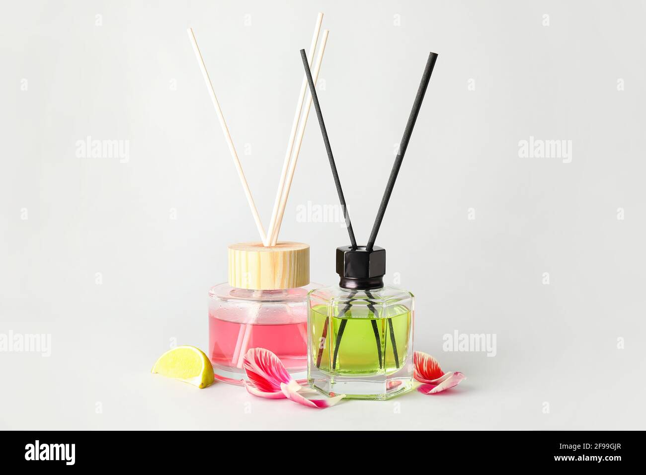 Reed diffusers on white background Stock Photo - Alamy