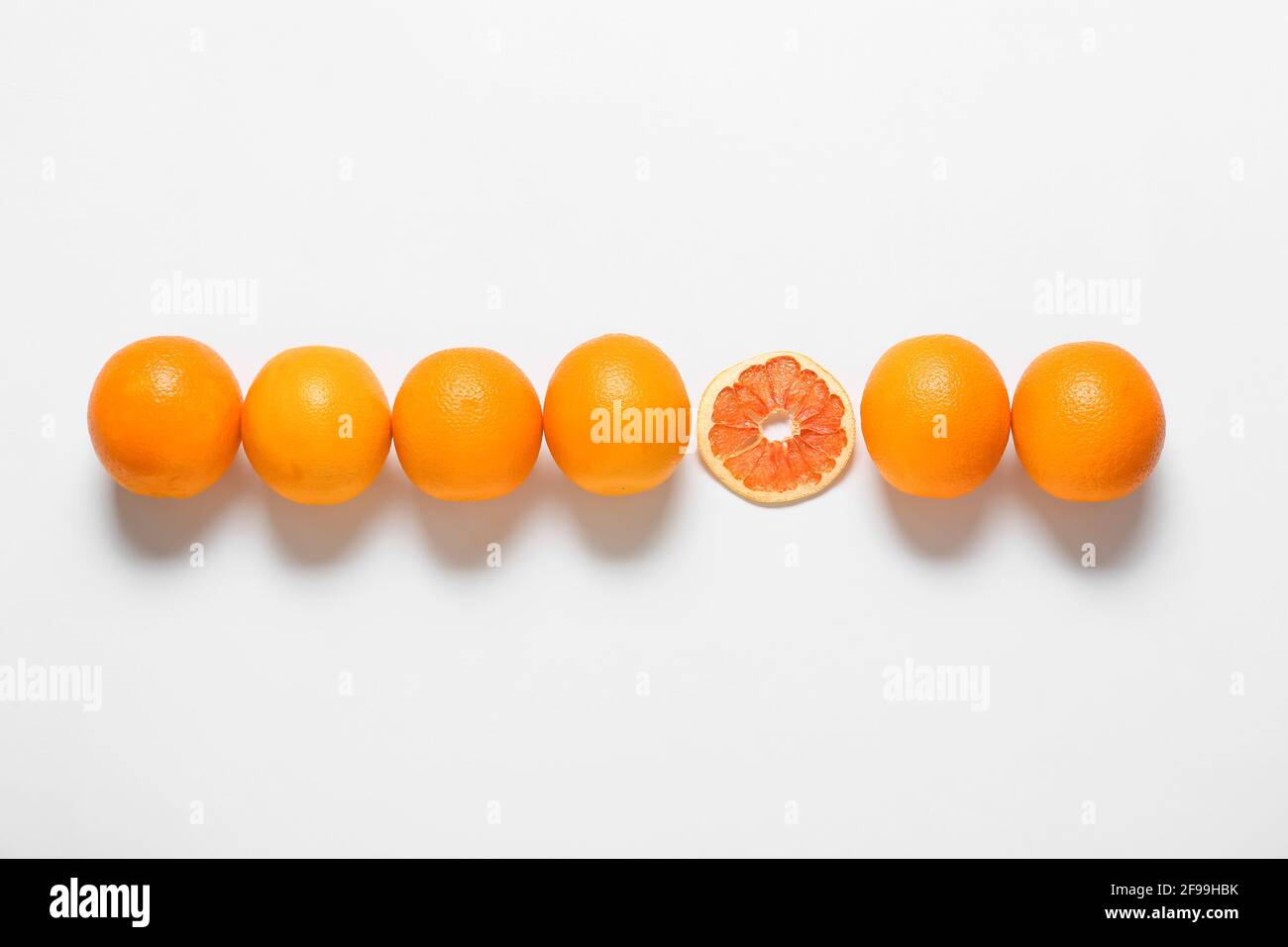 Tasty oranges on white background Stock Photo - Alamy