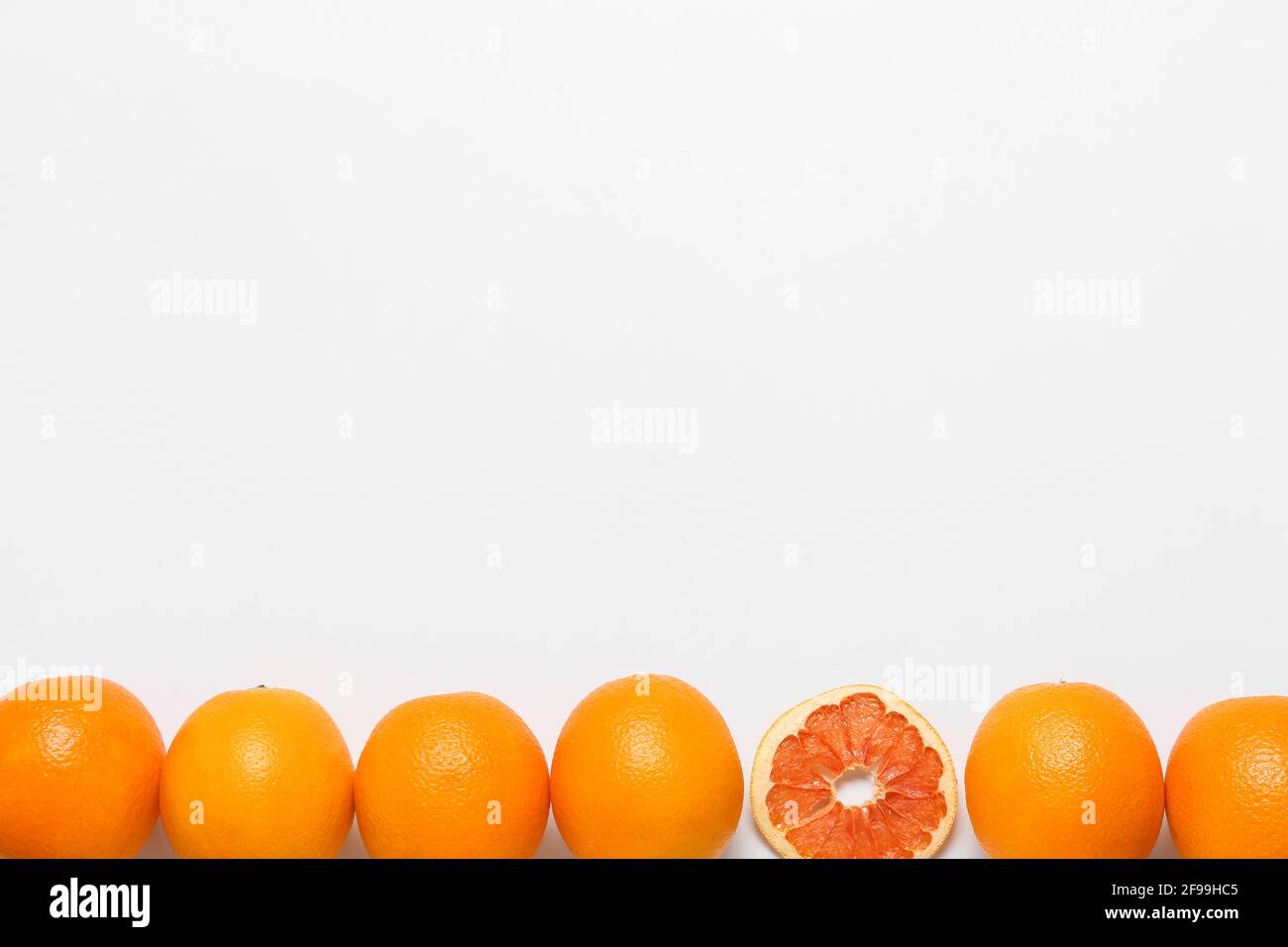 Tasty oranges on white background Stock Photo - Alamy