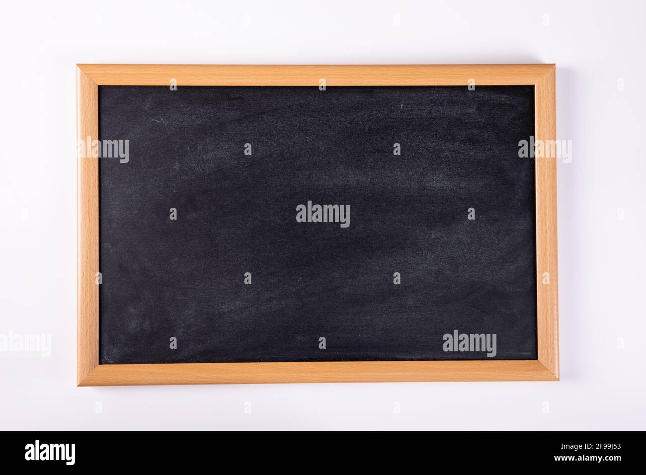 Isolated rectangular blackboard with wooden frame on white background ...