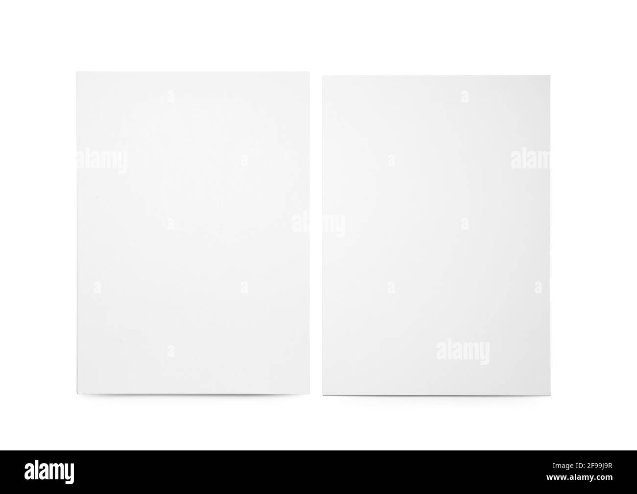 Blank sheets of paper on light background Stock Photo - Alamy