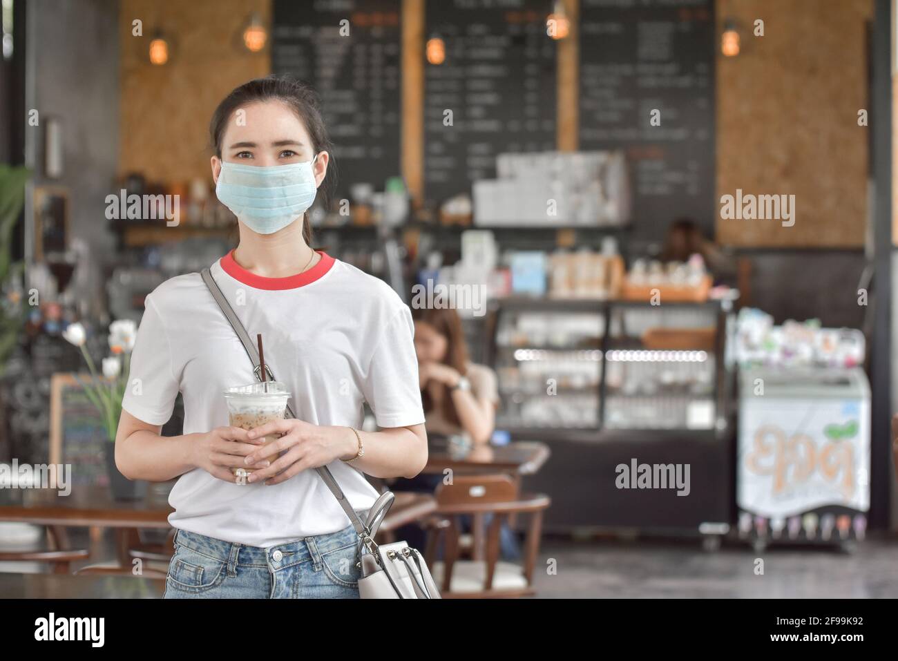 Asian women wear face mask in coffee cafe , Asian women wear mask ...