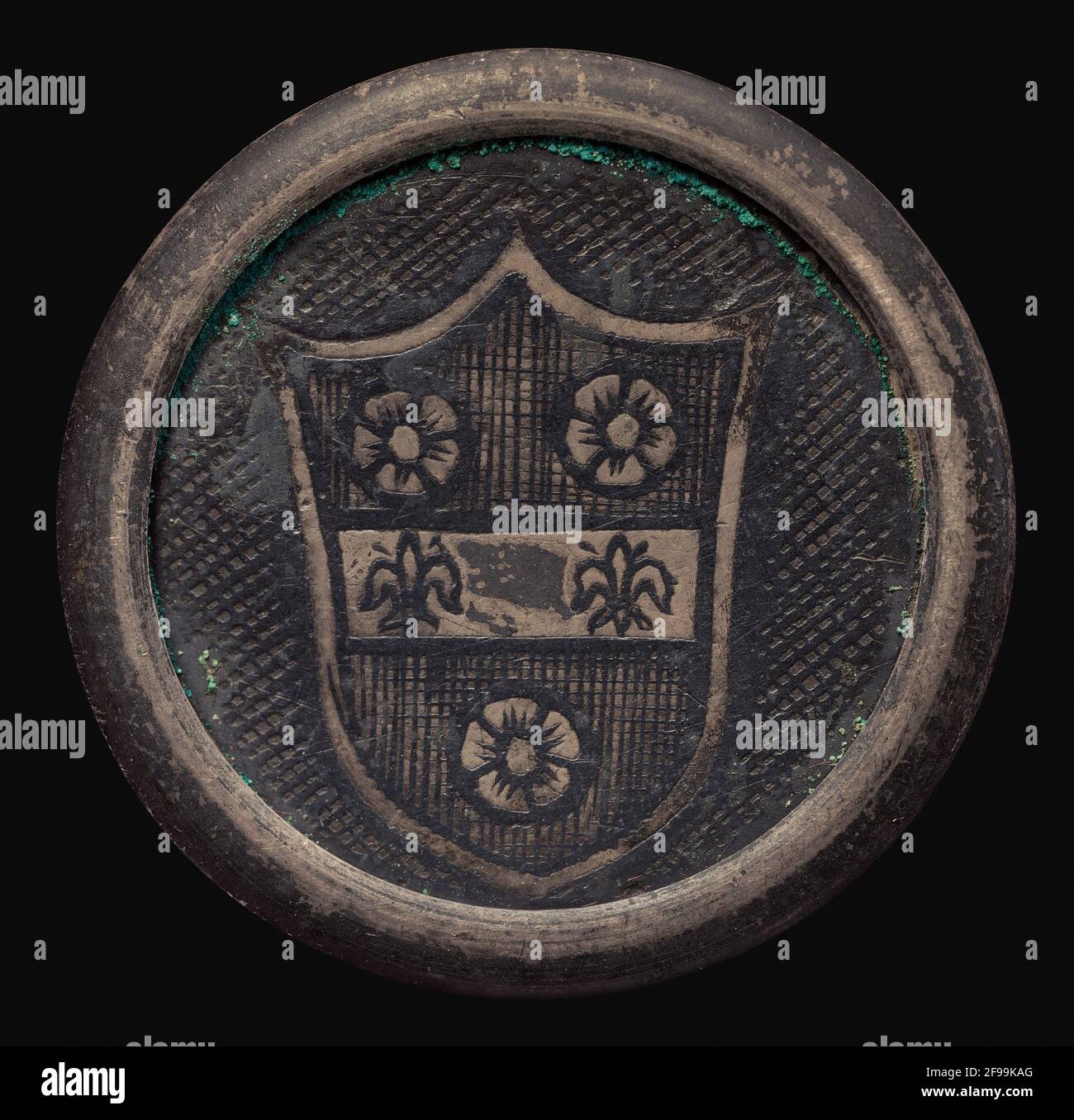 Shield with three roses and two fleur de lys Stock Photo - Alamy