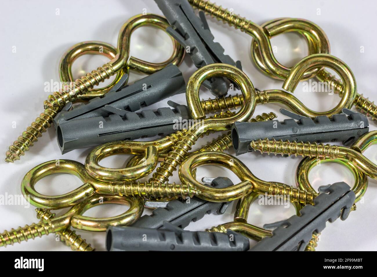 Closeup shot of golden hinge and dowel screws Stock Photo - Alamy