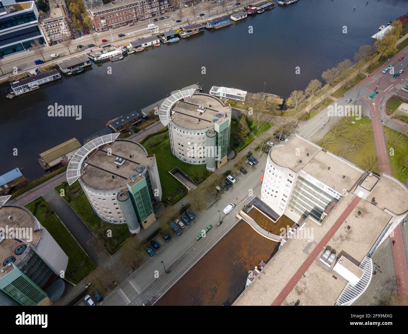 Aerial view of Amstel river with buildinds and boats ,in Amsterdam ...