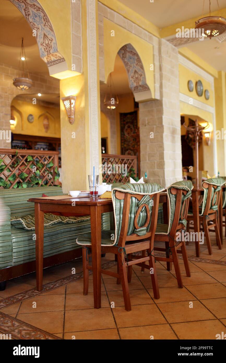 Interior of empty uzbek restaurant in the evening Stock Photo - Alamy