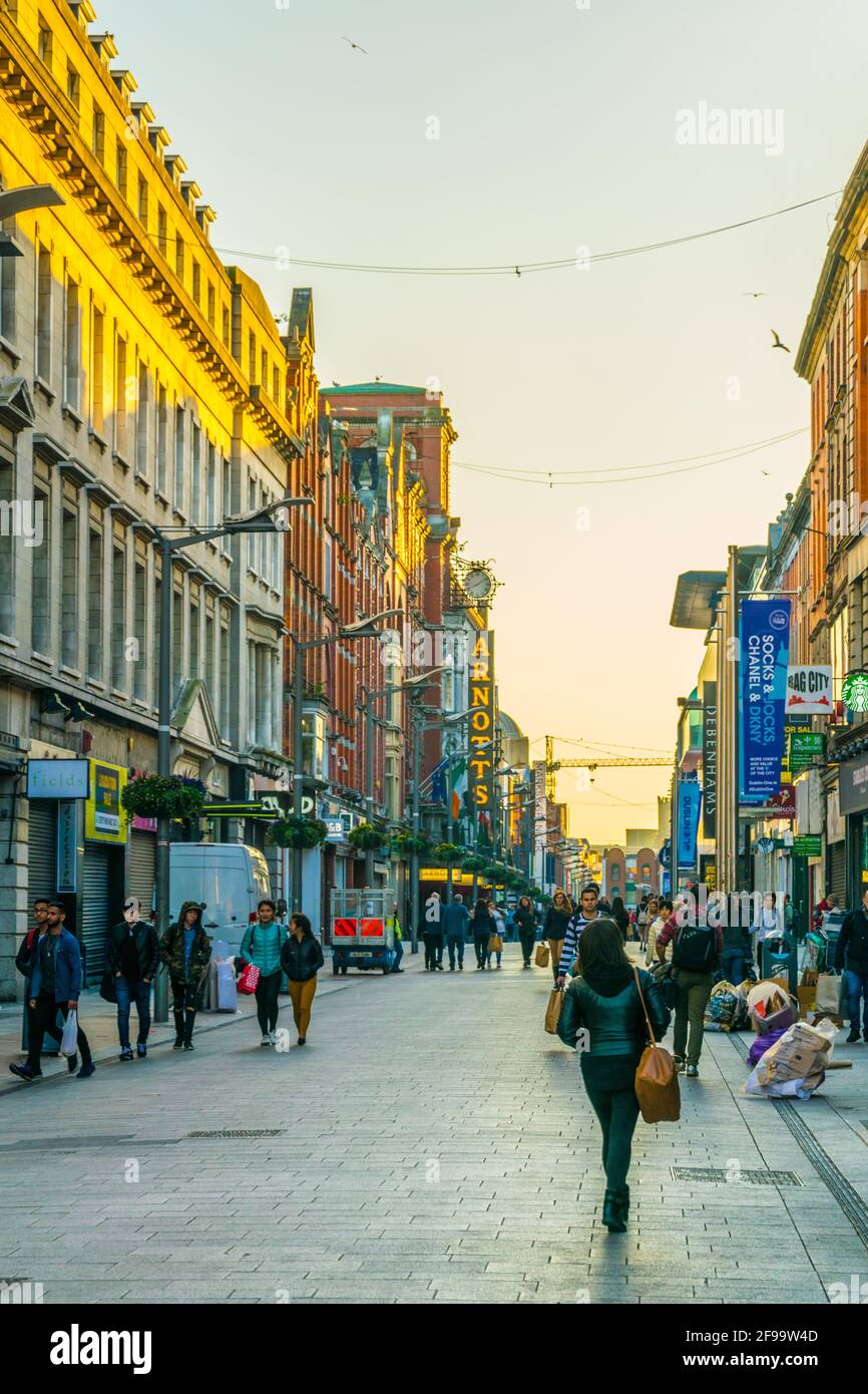 DUBLIN, IRELAND, MAY 9, 2017: People are strolling through a busy ...