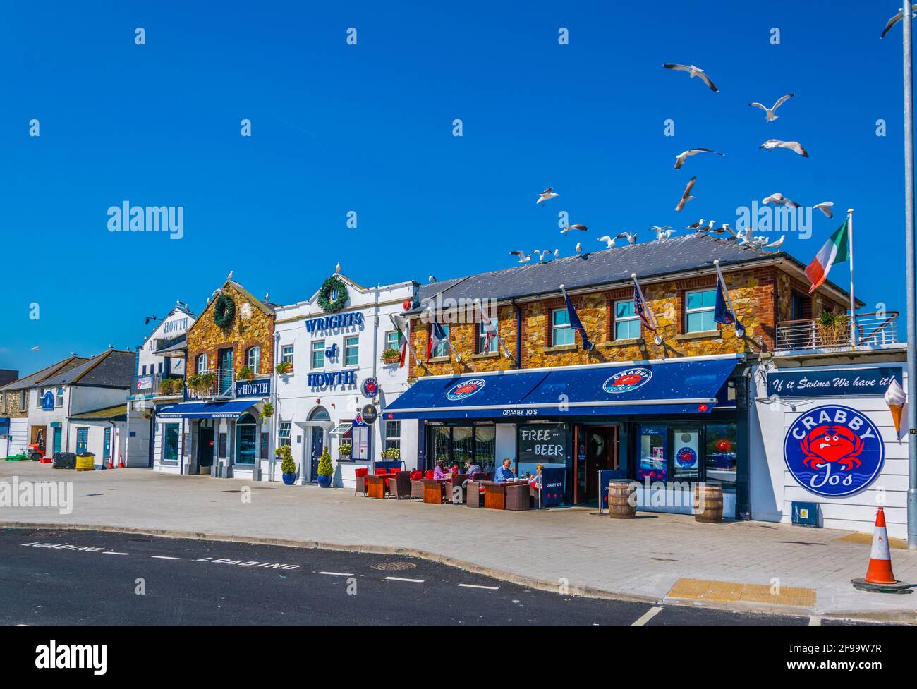 HOWTH, IRELAND, MAY 11, 2017: Fish restaurants in port of Howth ...