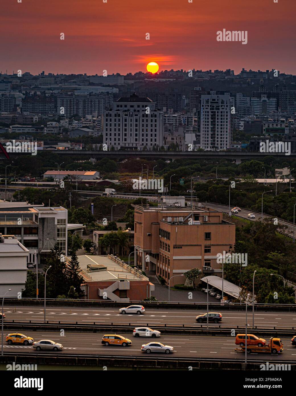 Setting Sun behind Dadu District in Taichung, Taiwan Stock Photo - Alamy