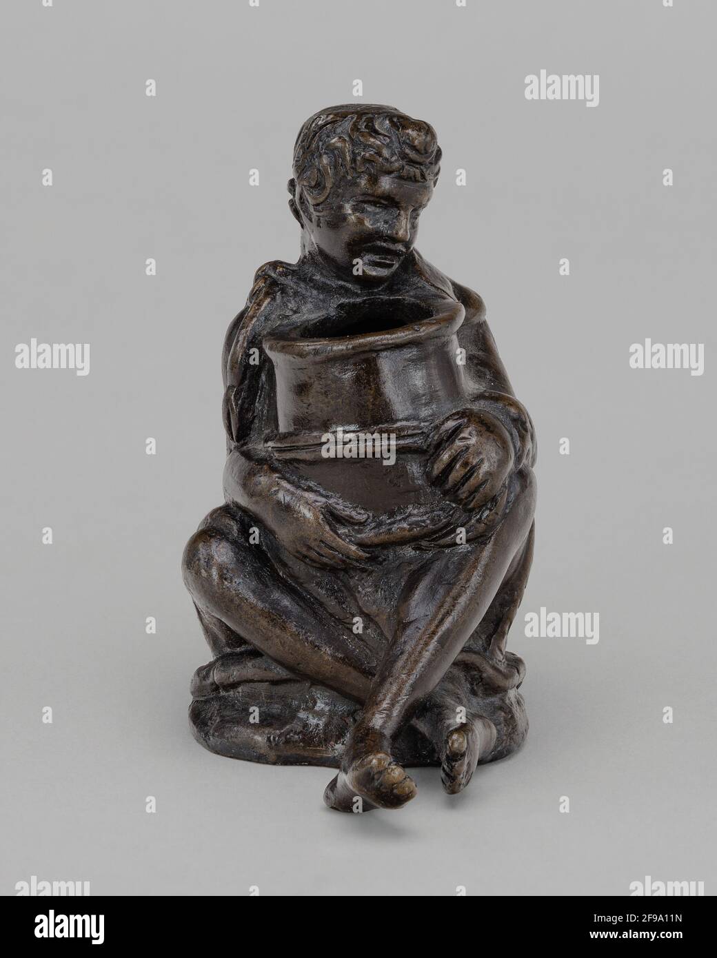 Seated Boy Holding a Jar (an Inkwell ?), first half 16th century Stock ...