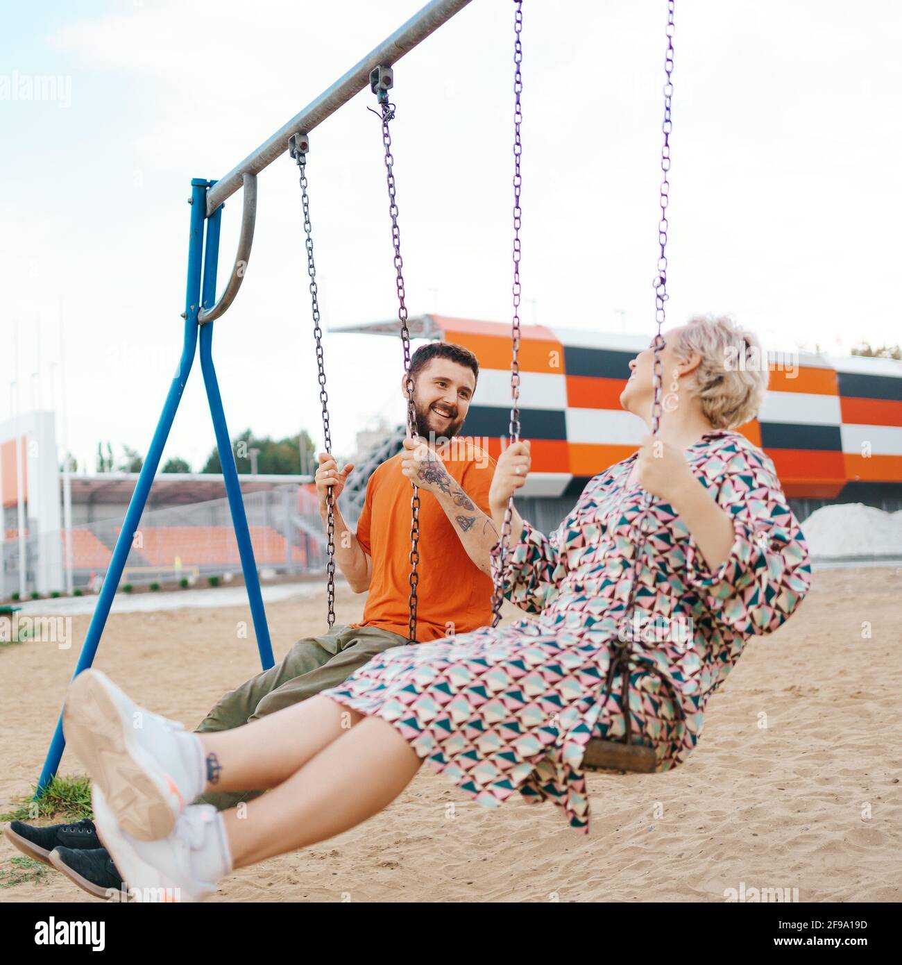 Romantic couple is having fun outside. Enjoying spending time together ...