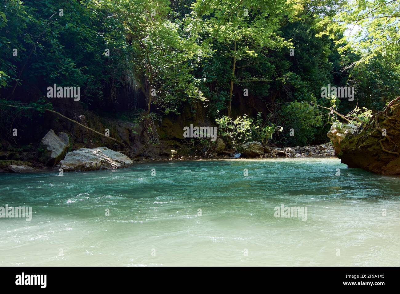 A beautiful view of blue-green water on a river Stock Photo - Alamy