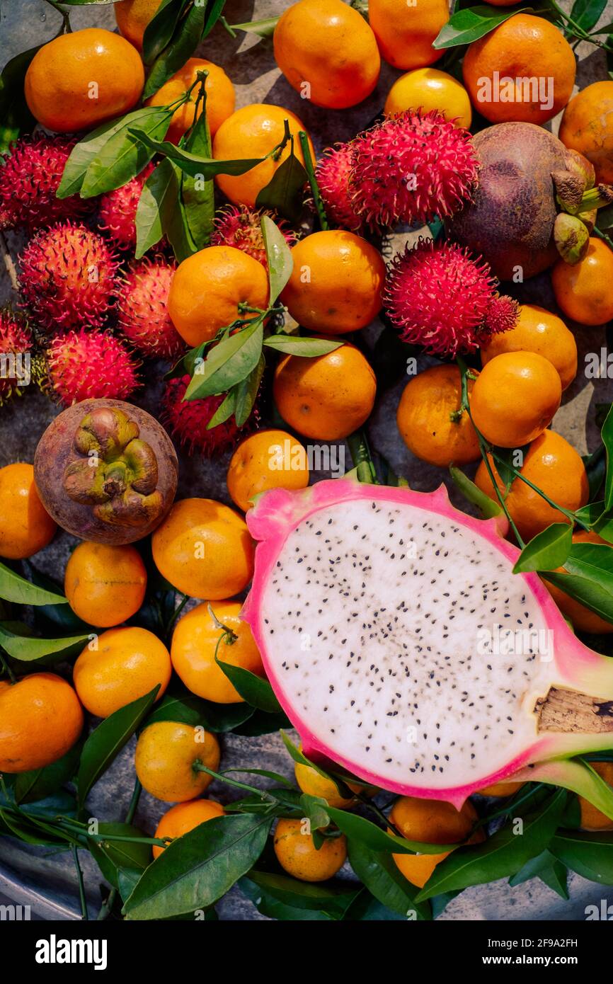 Healthy mixed tropical fruit and ingredients with dragon fruit, pitaya ...