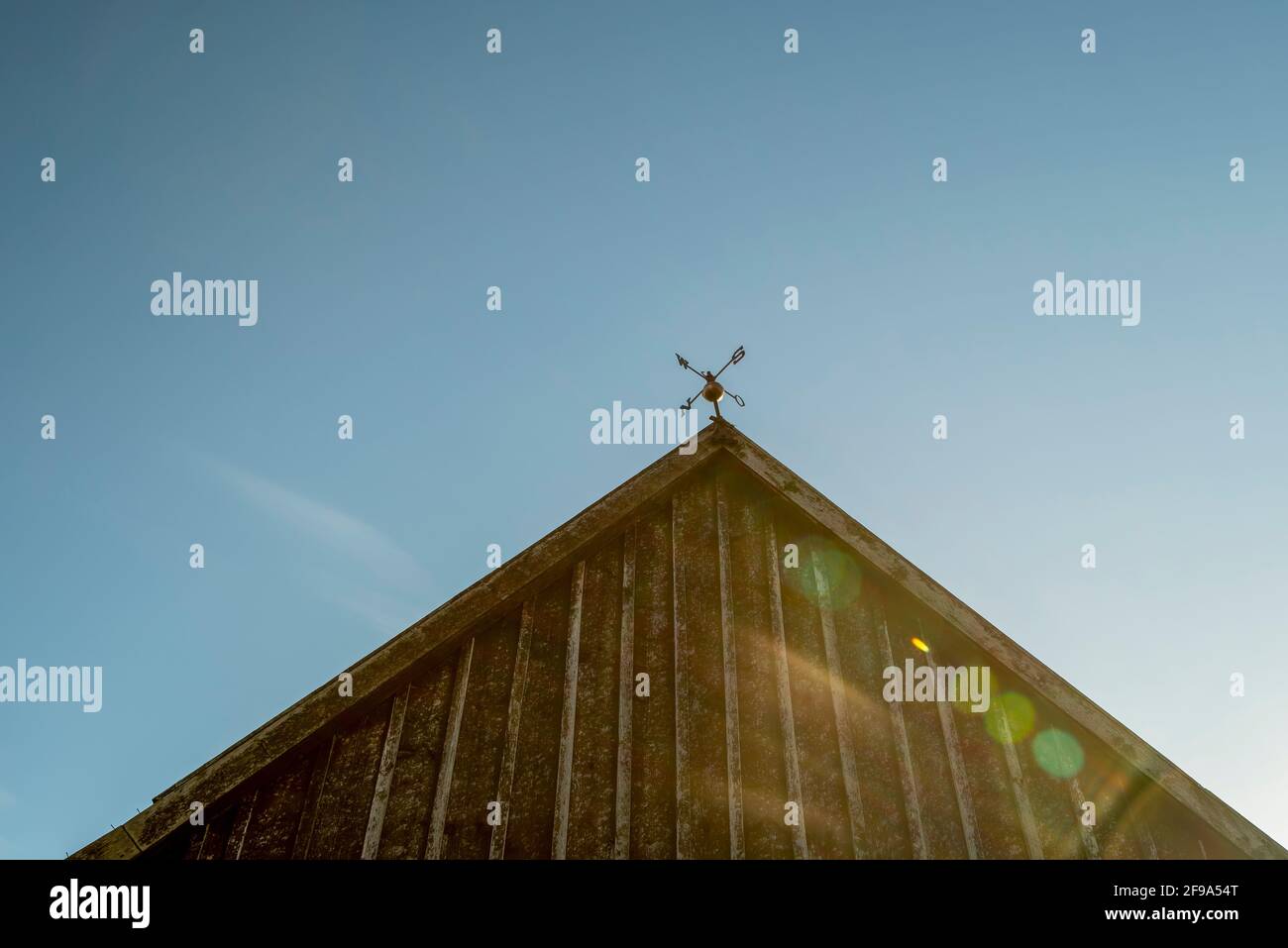 Old barn with a compass rose showing all four directions Stock Photo ...