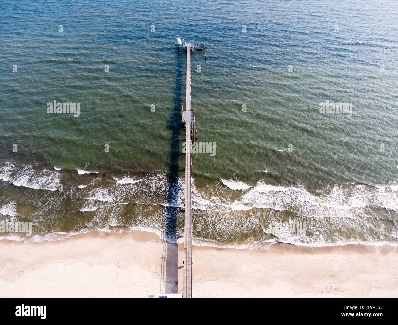 Zinnowitz, Germany. 17th Apr, 2021. The beach promenade with the pier ...