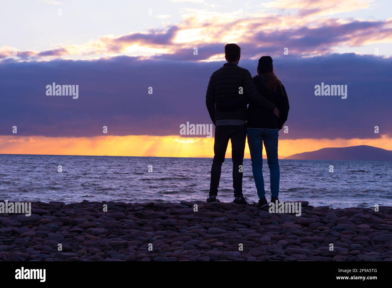 Standing on sea cliff sunset hi-res stock photography and images - Alamy