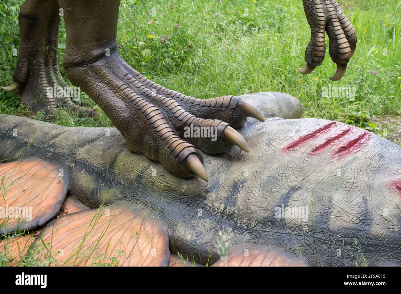 Allosaurus with dead stegosaurus, dinosaur models in Dinopark ...