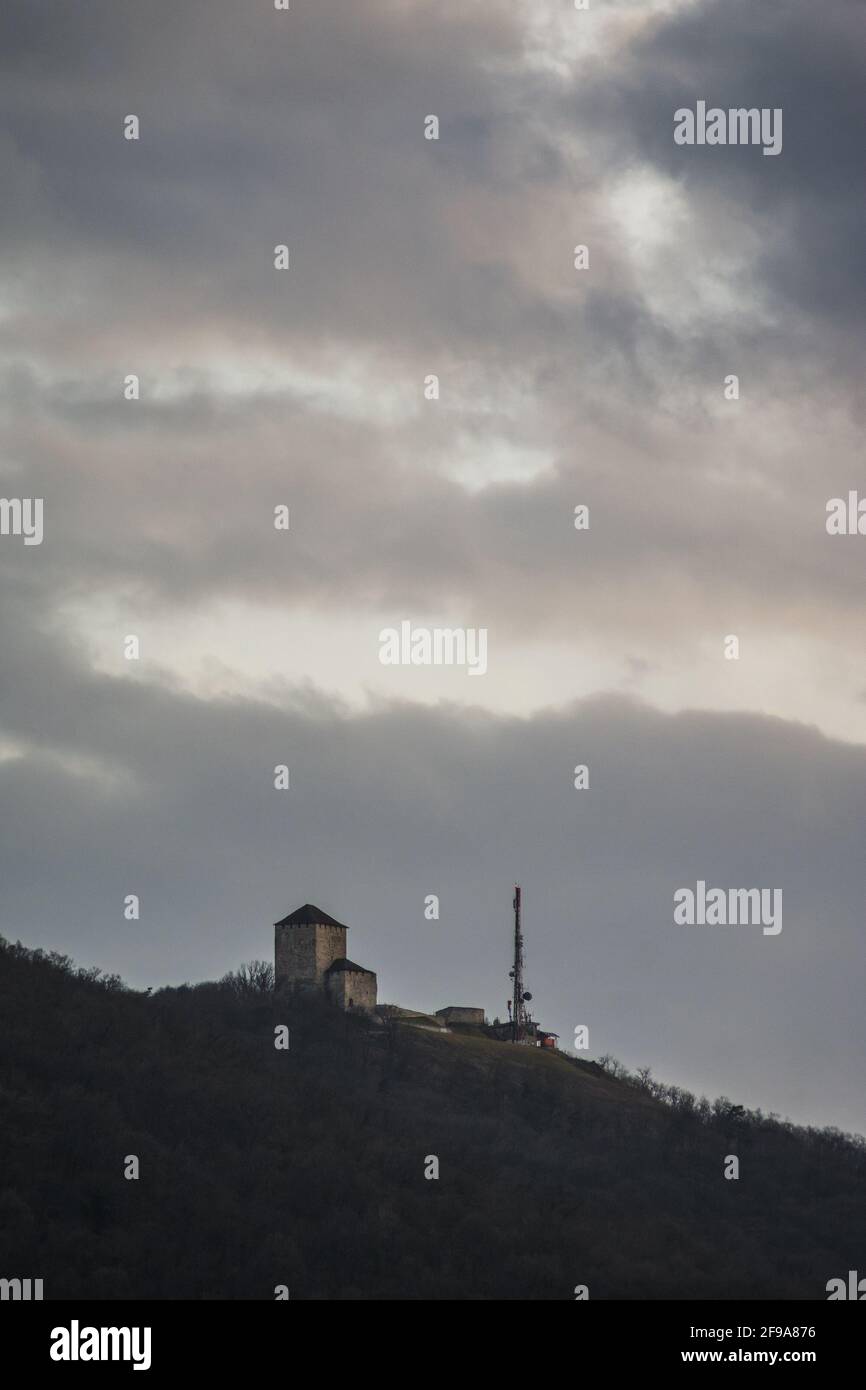 Scenic view of buildings and structures on top of a mountain under a ...