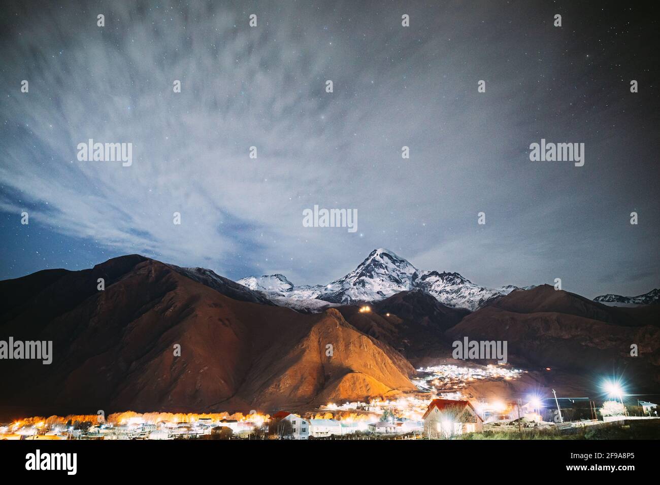 Stepantsminda, Georgia. Real Night Starry Sky With Glowing Stars Over ...