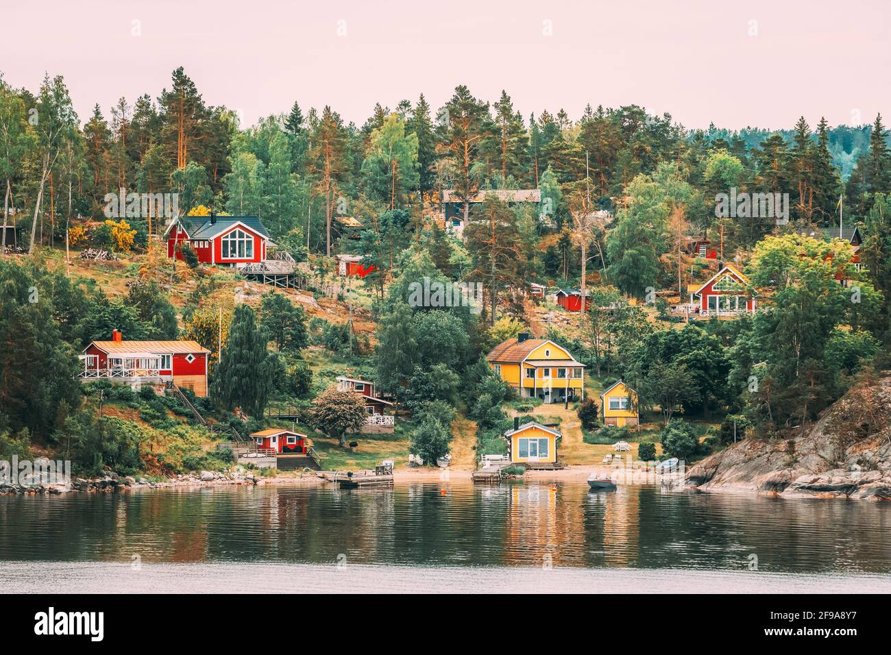 Sweden. Many Beautiful Red And Yellow Swedish Wooden Log Cabins Houses ...