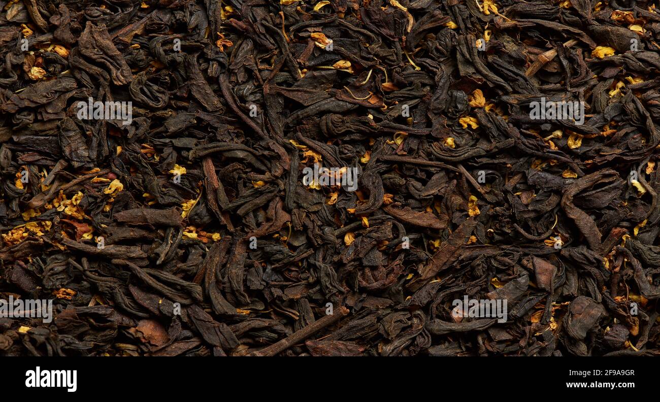 Tea texture with flower petals as a background Stock Photo - Alamy