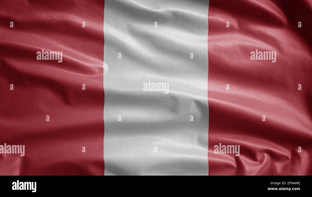 Peruvian flag waving in the wind. Close up of Peru banner blowing, soft ...