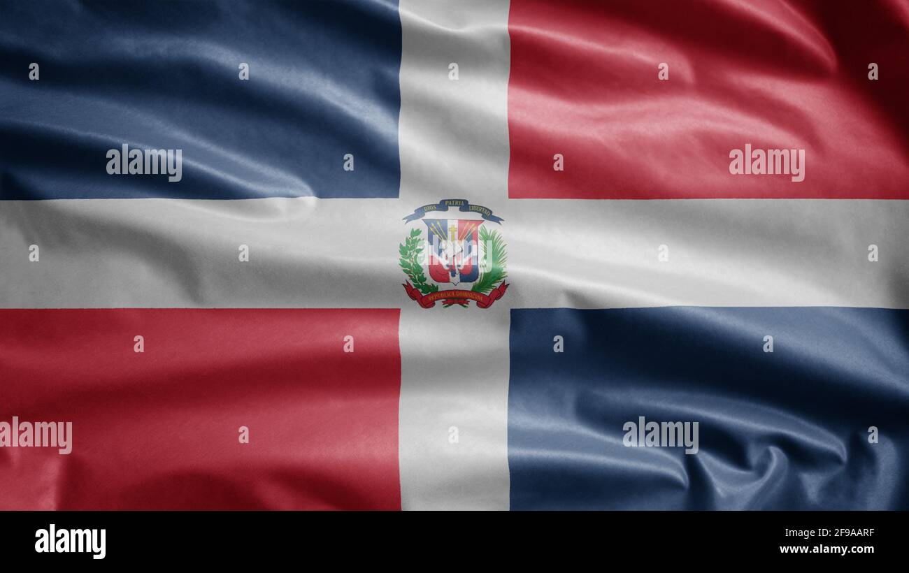 Dominicana flag waving in the wind. Close up of Dominican Republic ...