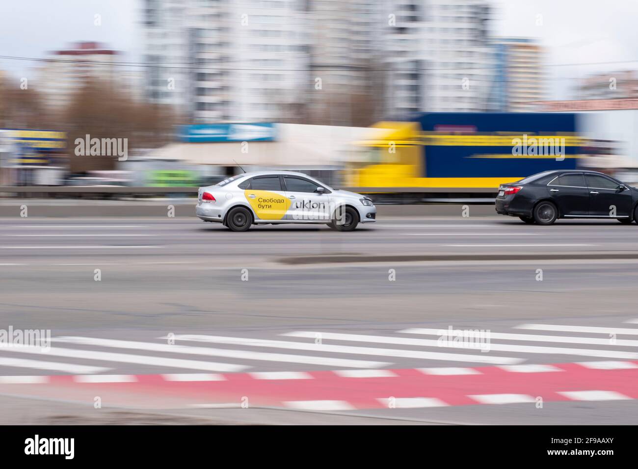 Ukraine, Kyiv - 18 March 2021: Taxi Uklon White Volkswagen Polo car ...