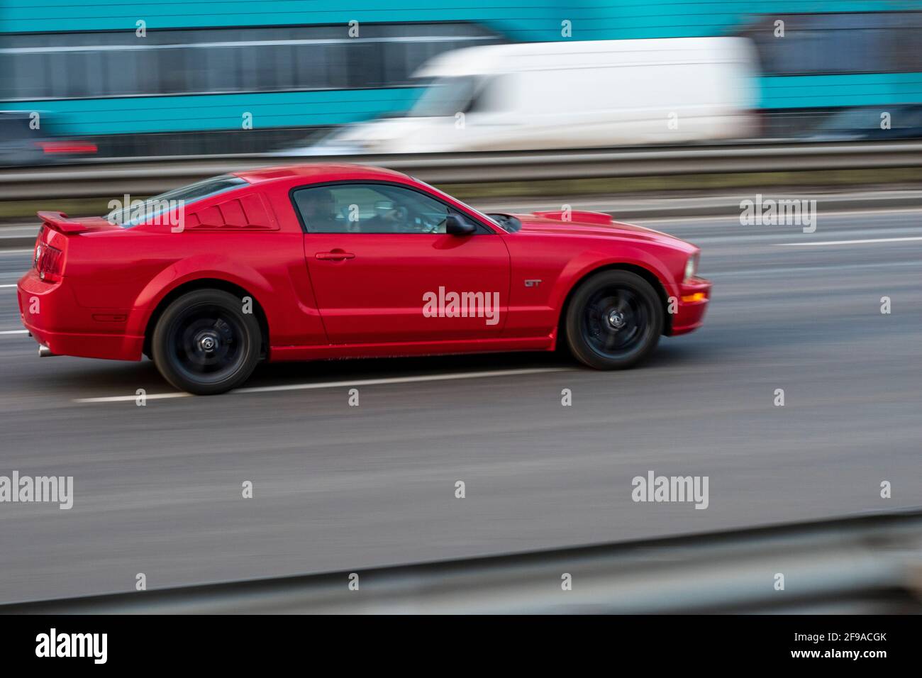 Ukraine, Kyiv - 11 March 2021: Red Ford Mustang car moving on the ...