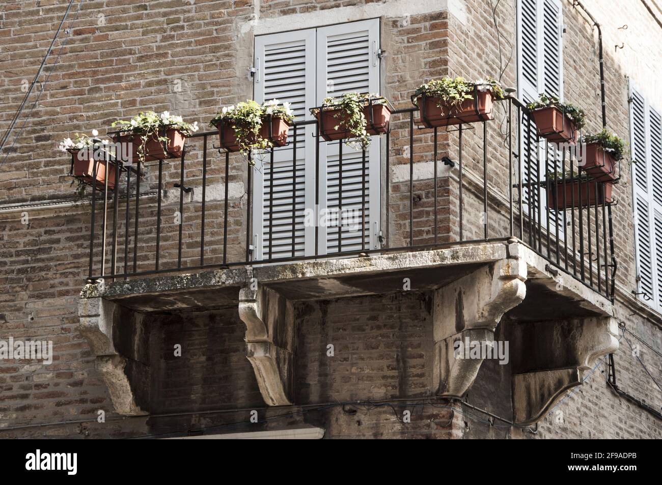 Ancient residential building balcony beautifully adorned with flower ...