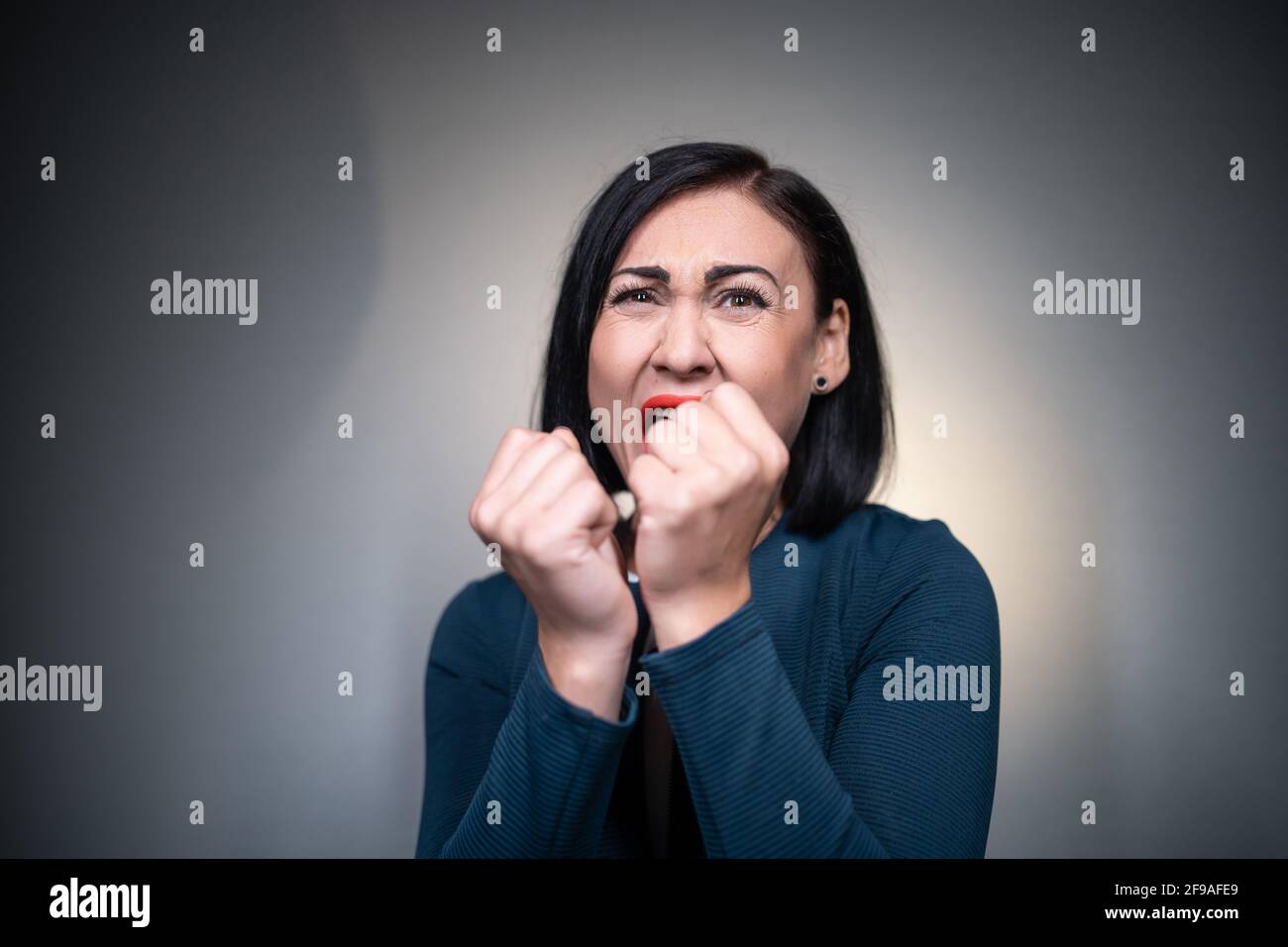 Scared female face hi-res stock photography and images - Alamy
