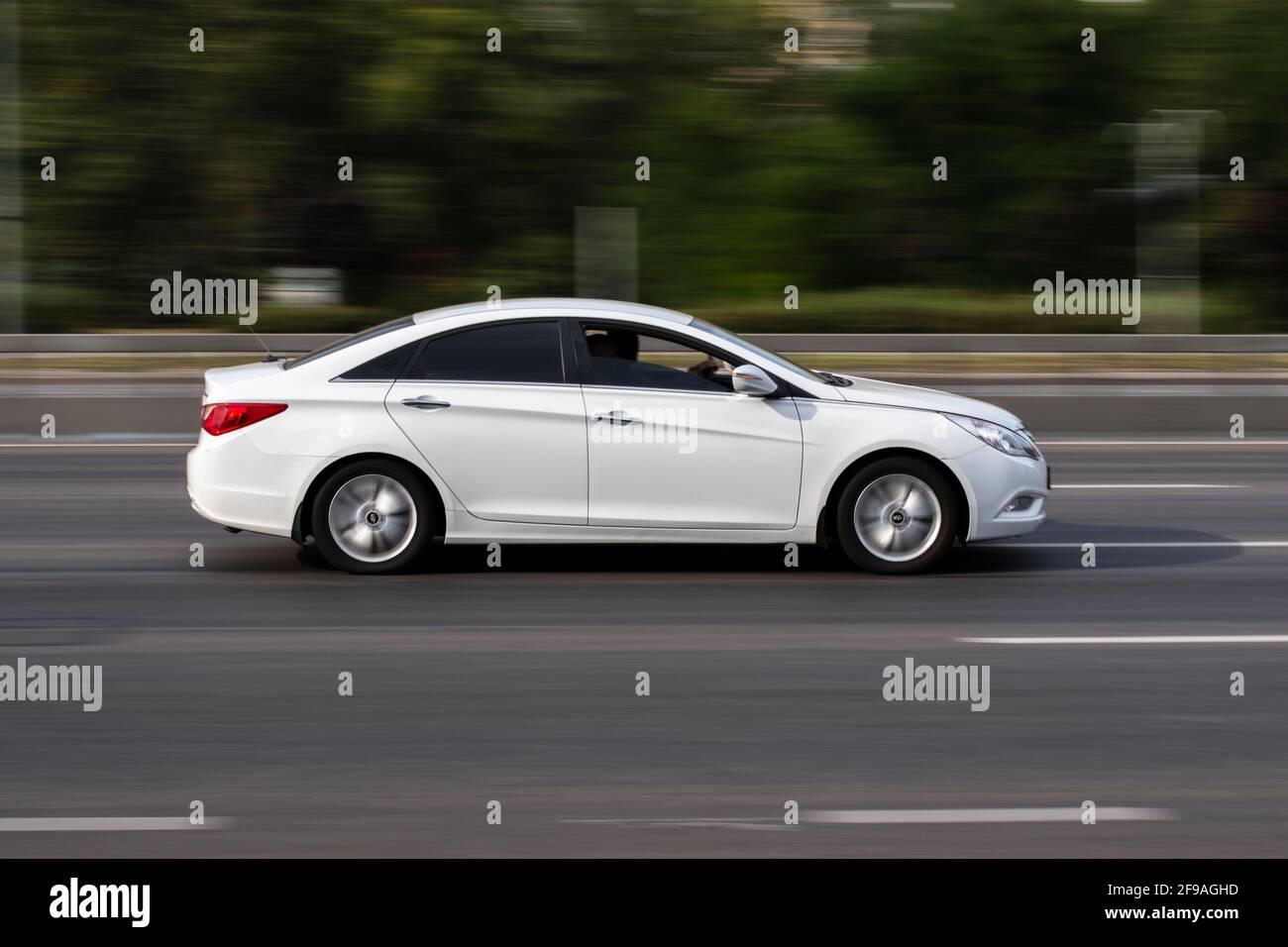 Ukraine, Kyiv - 24 September 2020: White car moving on the street Stock ...