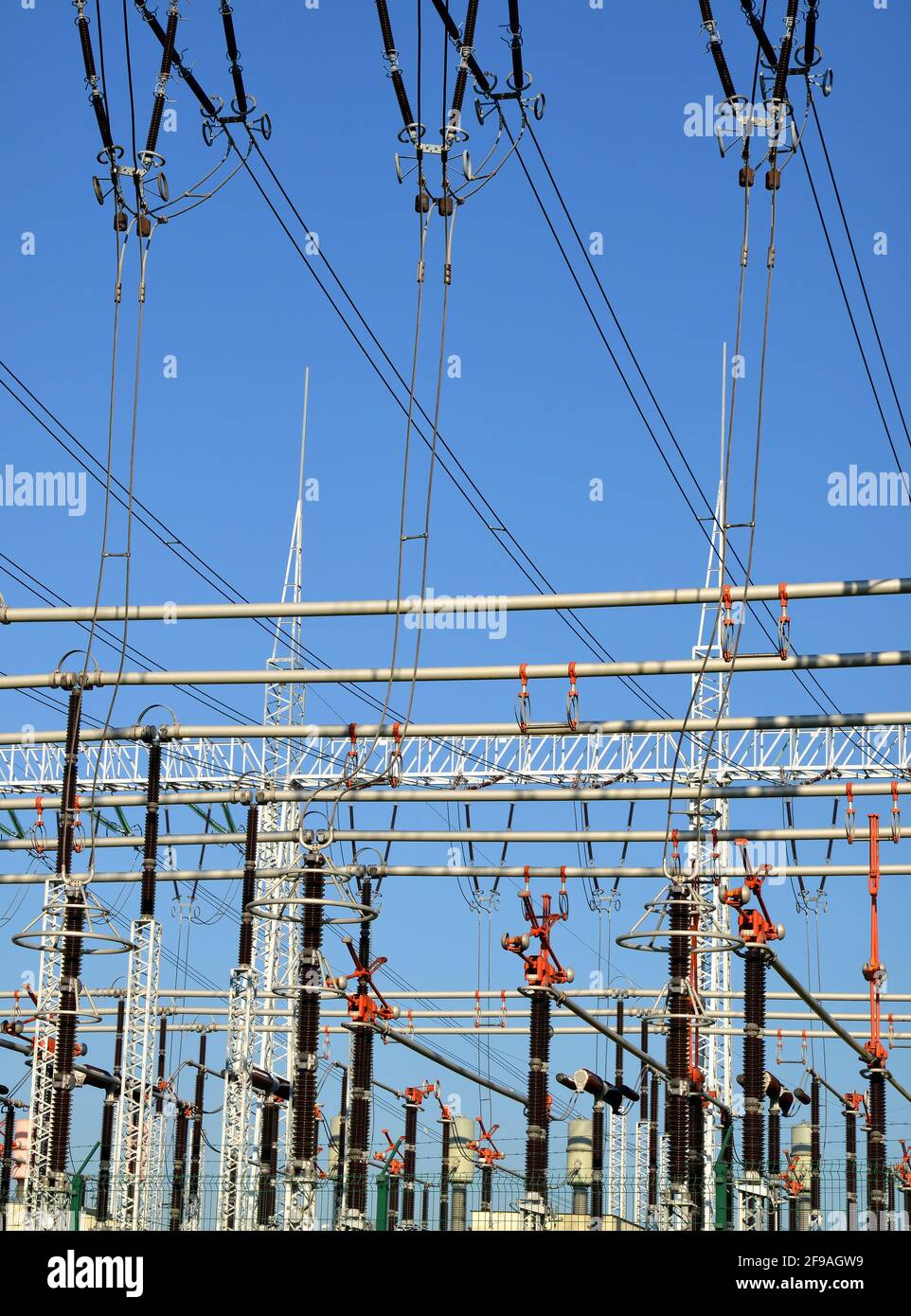 High voltage power substation on blue sky background Stock Photo - Alamy