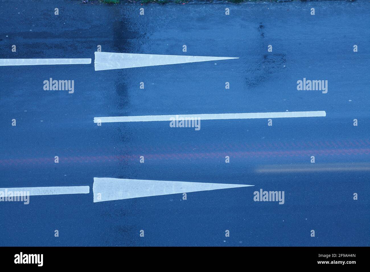 Arrows as street markings hi-res stock photography and images - Alamy
