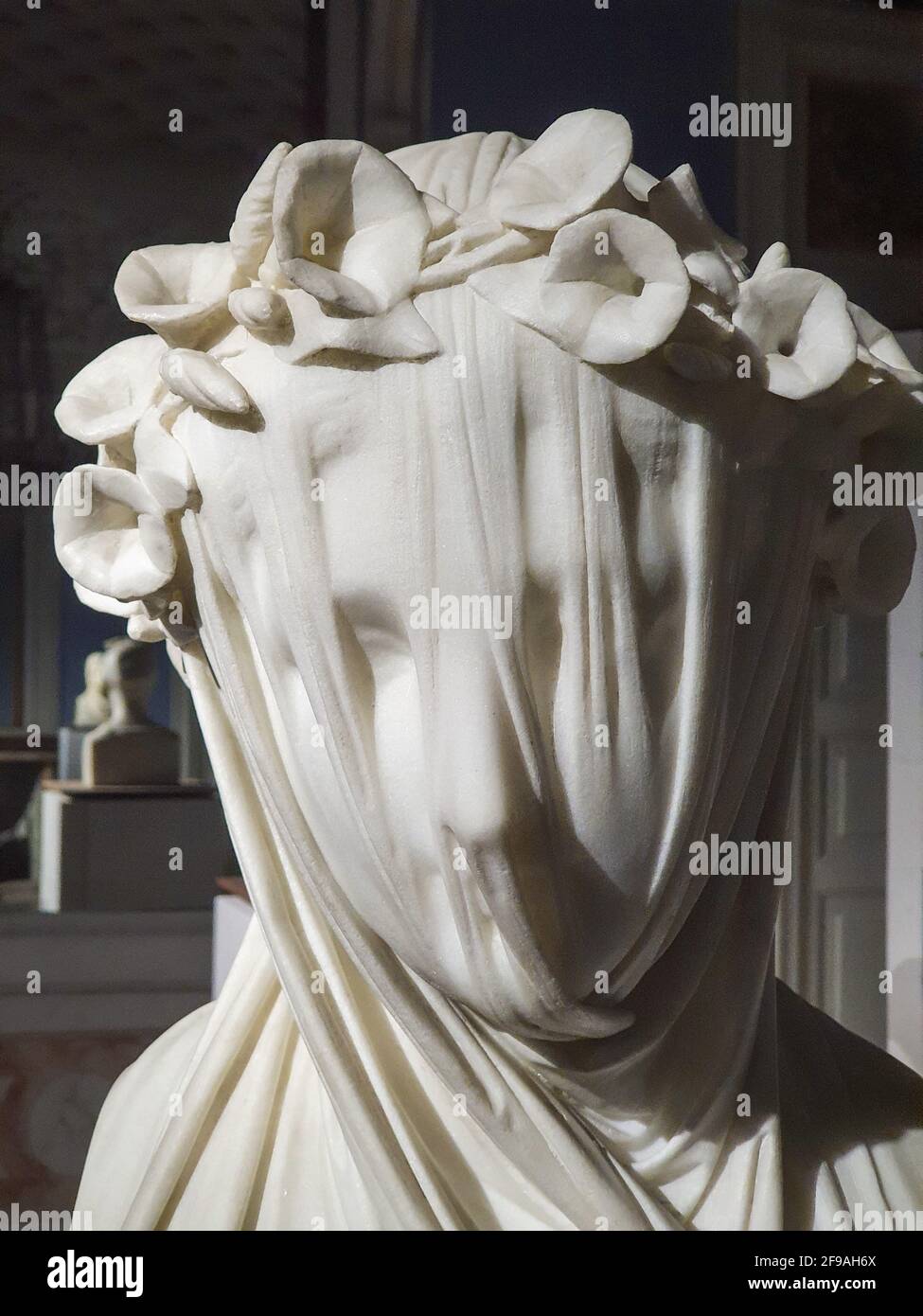 Vertical shot of the Veiled Vestal Sculpture in a museum Stock Photo ...