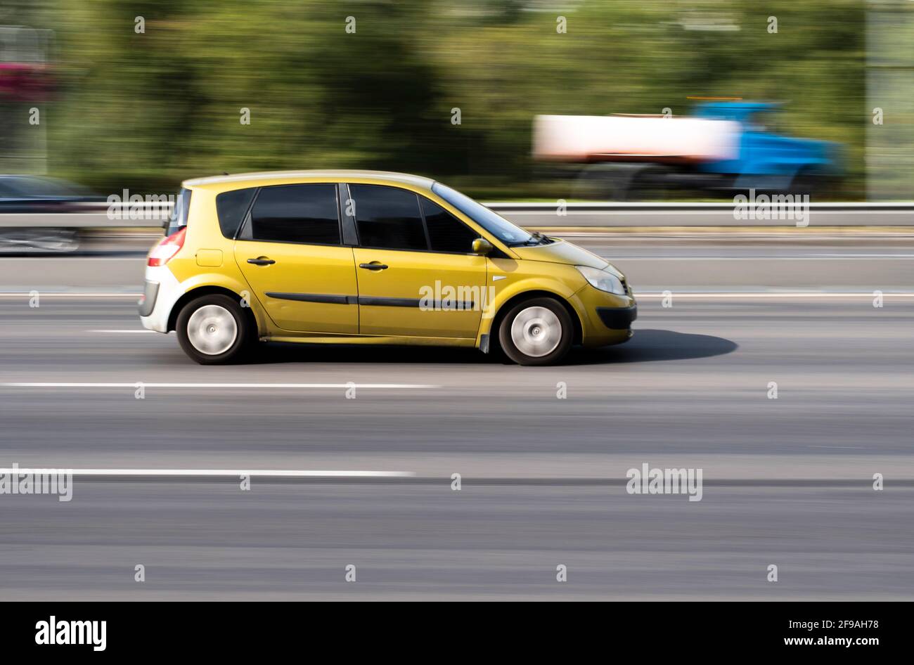 Ukraine, Kyiv - 24 September 2020: Yellow Renault Scenic II car moving ...