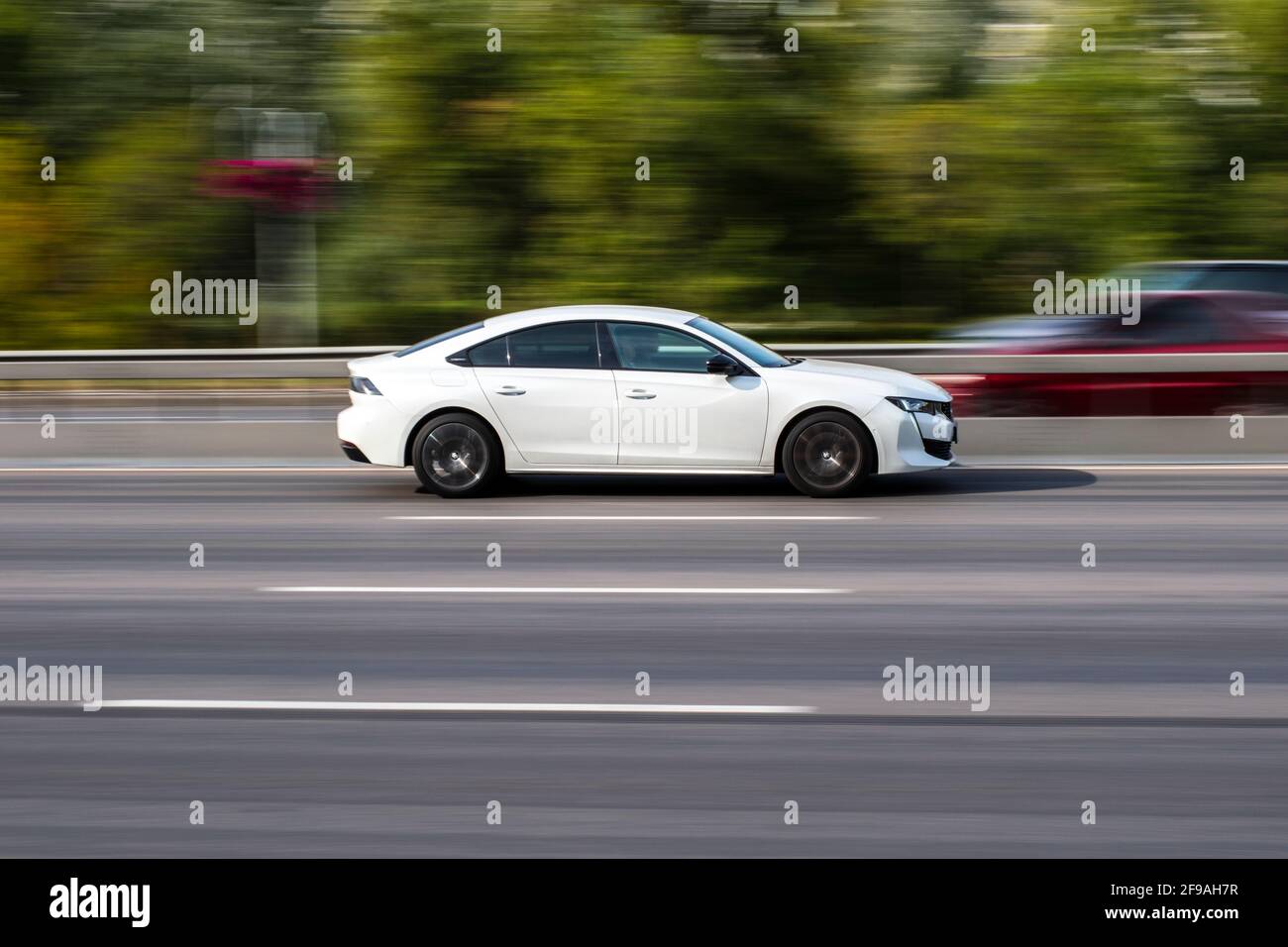 Ukraine, Kyiv - 24 September 2020: White car moving on the street Stock ...
