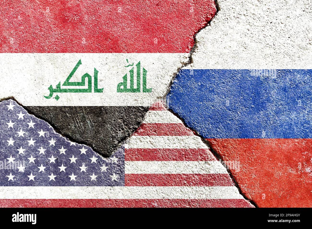 Political conflict concept Iraq VS USA VS Russia, flags on a cracked ...