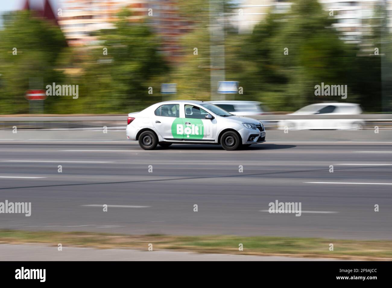 Ukraine, Kyiv - 24 September 2020: Bolt taxi car moving on the street ...