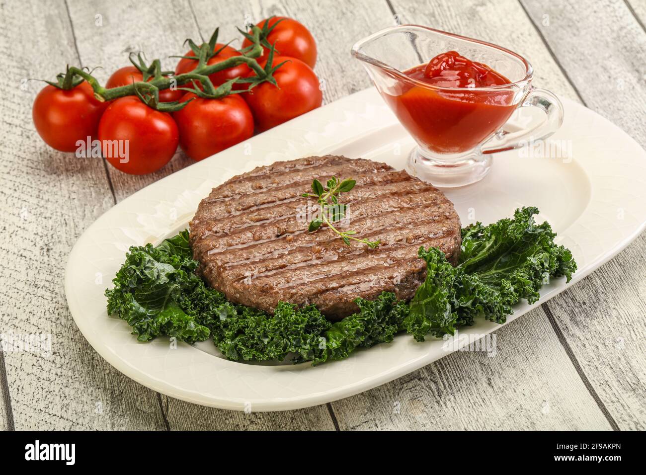 Grilled tasty beef cutlet for burger Stock Photo - Alamy