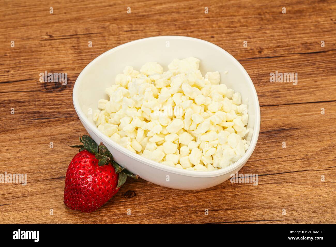Dietary food - grain cottage cheese in the bowl Stock Photo - Alamy