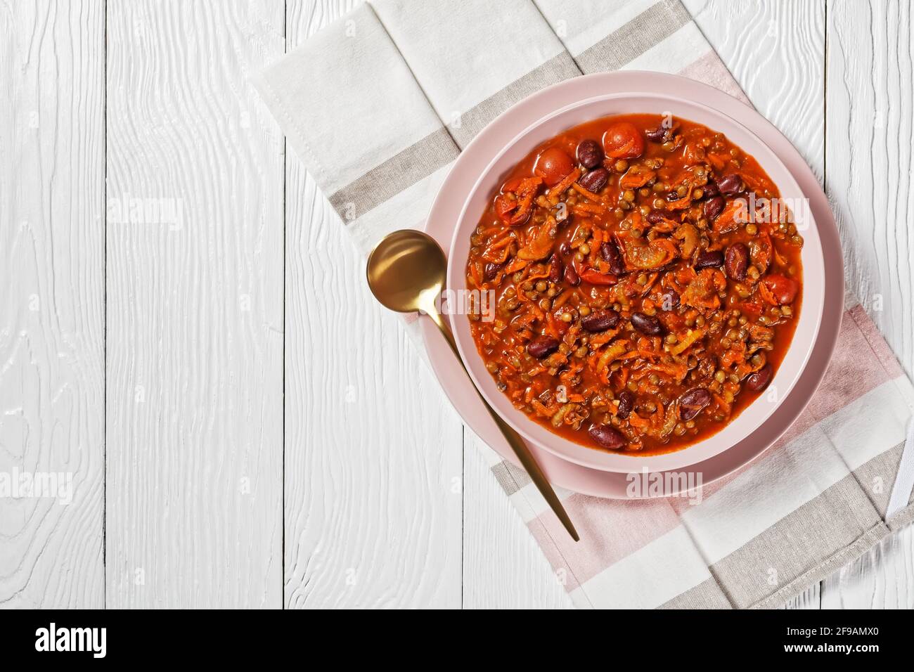 vegetarian meatless chili with kidney beans and lentils in a bowl on a ...