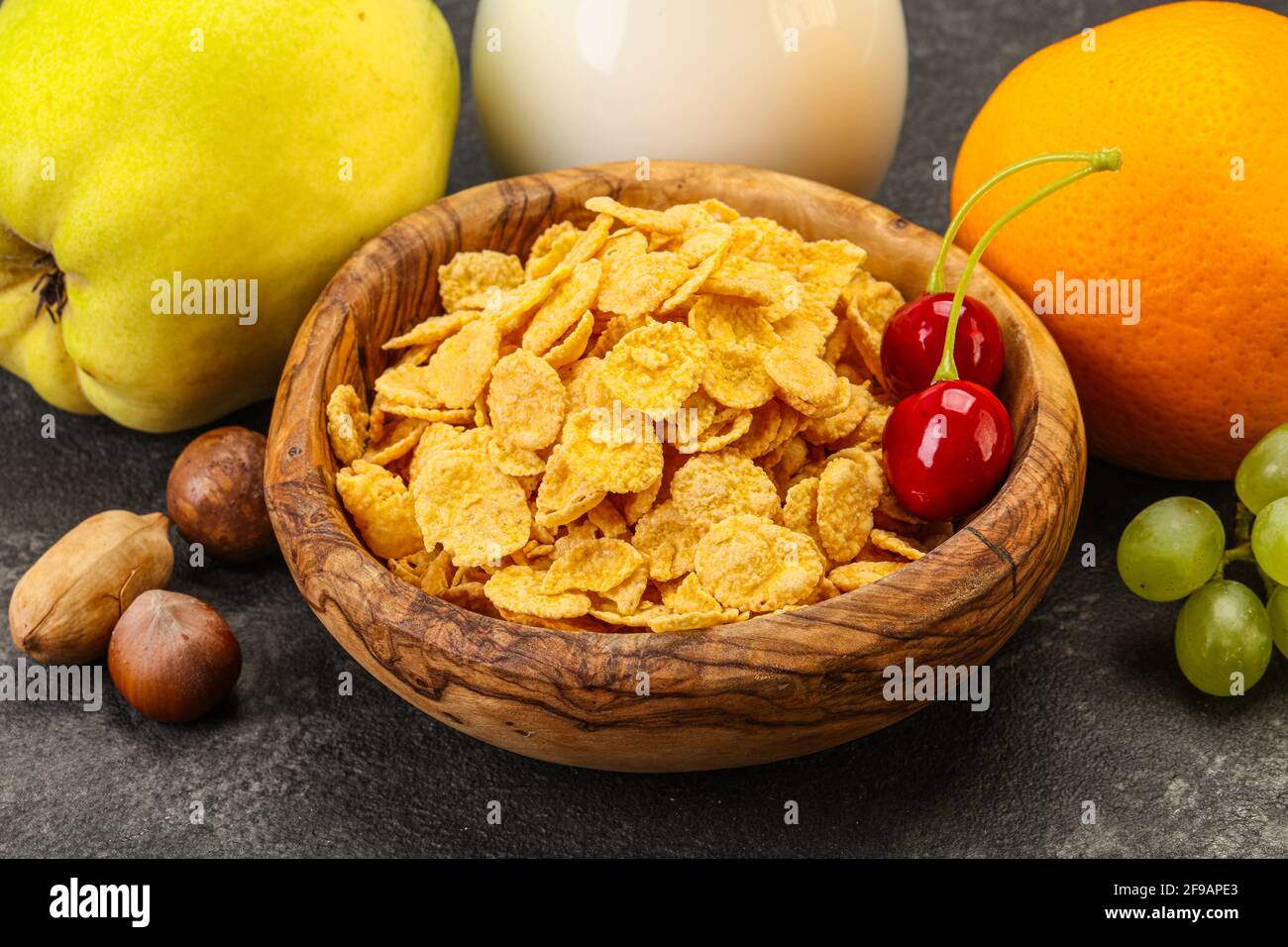 Breakfast with corn flakes, fruits and milk Stock Photo - Alamy