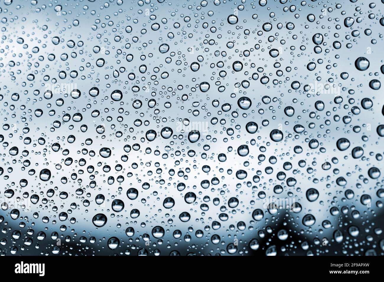 Water drops on glass after hi-res stock photography and images - Alamy