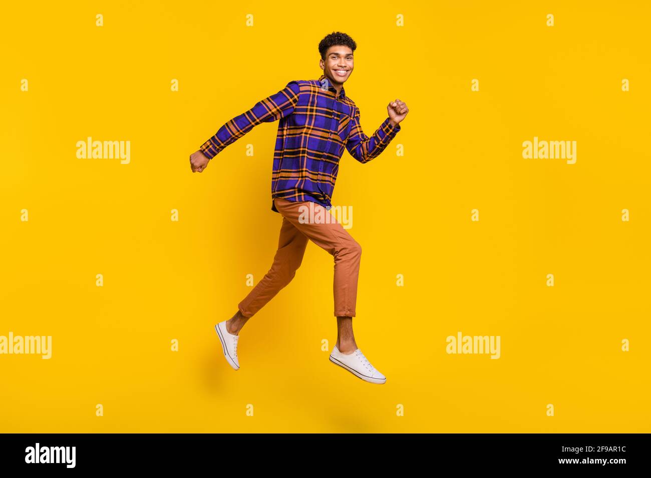 Full length body size side profile photo of young man careless jumping ...