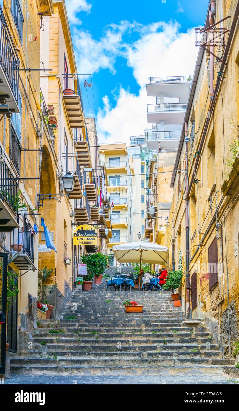 AGRIGENTO, ITALY, APRIL 22, 2017: View of a narrow street in the ...